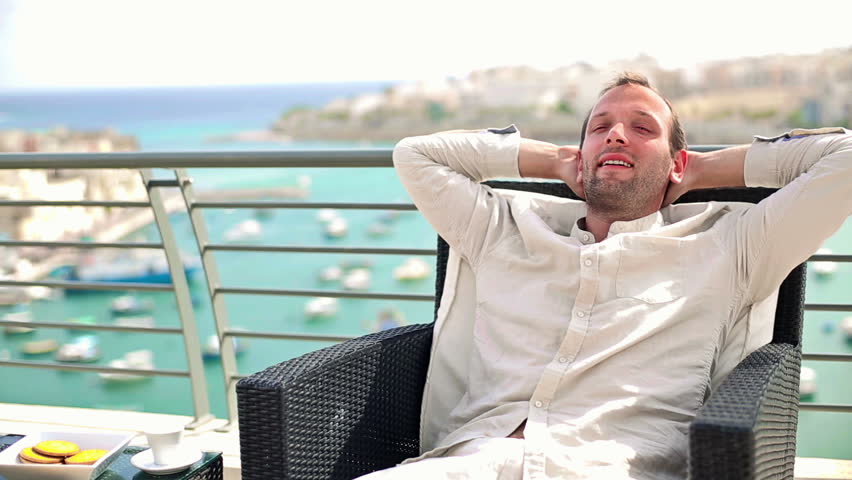 young happy man relaxing on beautiful Stock Footage Video (100% Royalty ...
