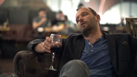 Drunk Man Drinking Red Wine Sitting Stock Footage Video (100% Royalty ...