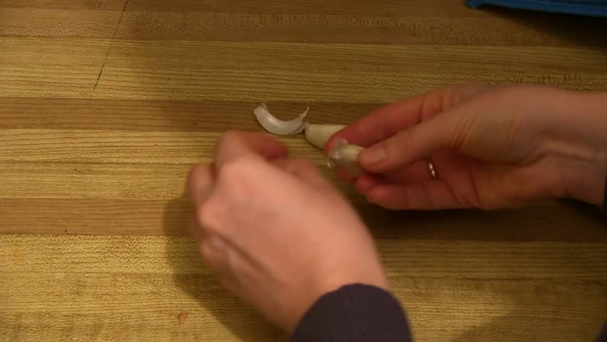 Girl Cooking Garlic Stock Footage Video (100% Royalty-free) 3181222 ...