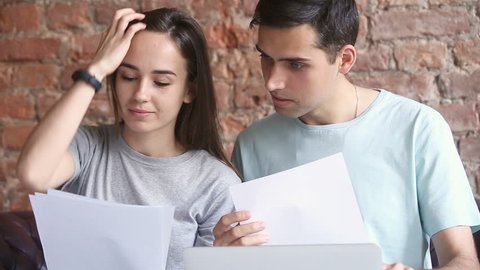 Young Family Couple Holding Looking Documents Stock Footage Video (100% ...