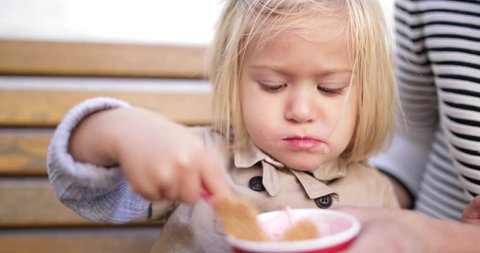 Child Eating Ice Cream On Bench Stock Footage Video (100% Royalty-free ...