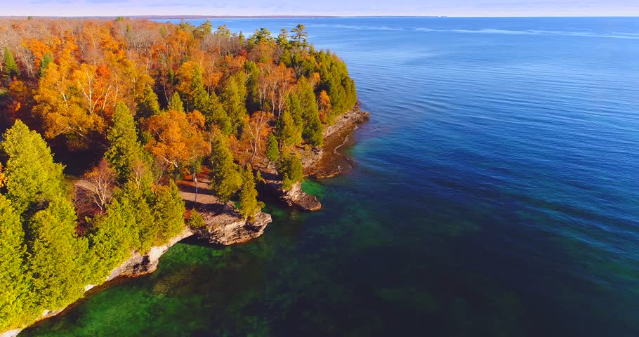 Rocky Shoreline with trees and Autumn Leaves image - Free stock photo ...