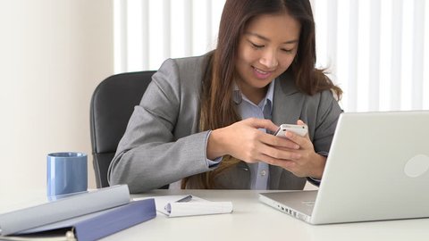 Asian Businesswoman Texting While Working Desk Stock Footage Video (100 ...