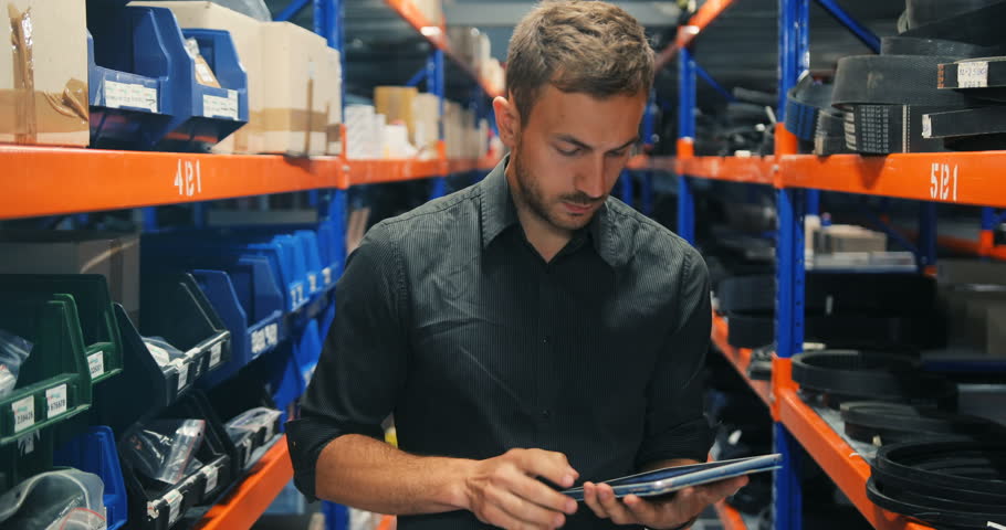 young man working hardware warehouse standing Stock Footage Video (100% ...