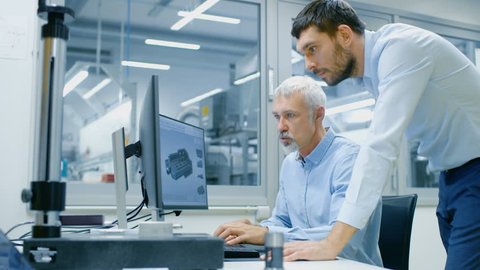 Industrial Designer Has Discussion Senior Engineer Stock Footage Video ...