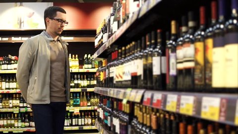 Young Man Shopping Liquor Store He Stock Footage Video (100% Royalty ...