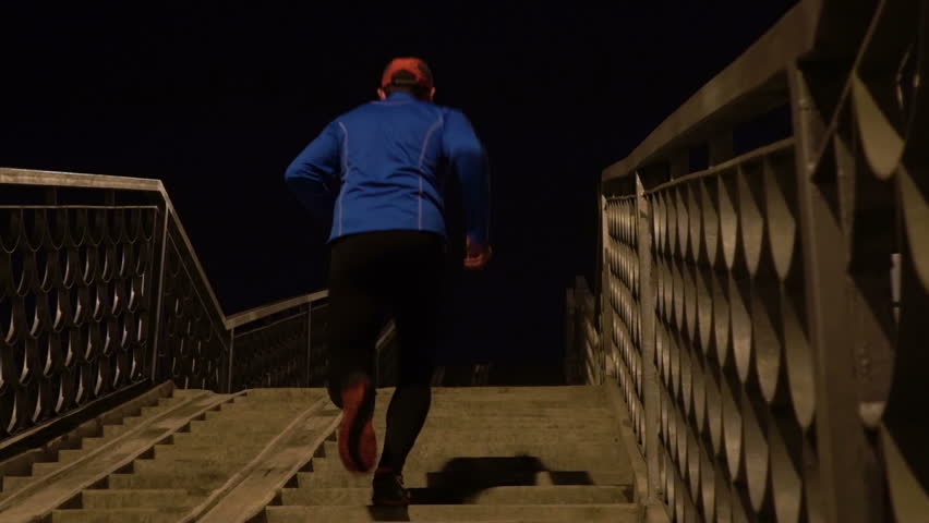 Sportsman Jogging at Night Outdoors Stock Footage Video (100% Royalty ...