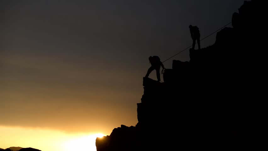 Team Struggle to Achieve Climbing Stock Footage Video (100% Royalty ...