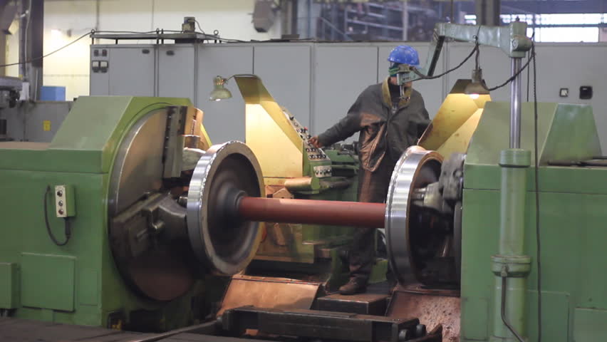 worker on machine metal working lathe Stock Footage Video (100% Royalty ...