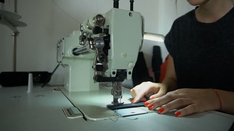 Slow Motion Seamstress Sewing Belt Using Stock Footage Video (100% ...