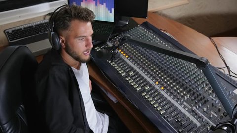 Tired Radio Presenter Headphones Speaks Into Stock Footage Video (100% ...