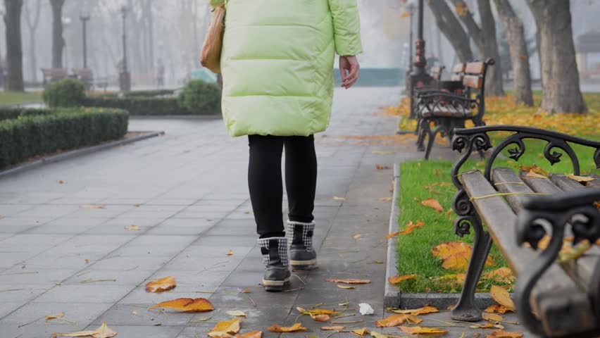 woman littering on lawn person throws Stock Footage Video (100% Royalty ...