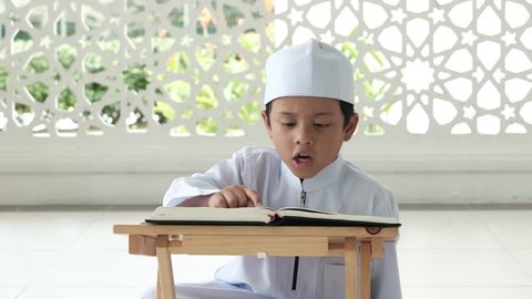 Young Muslim Boy Wearing White Jubah Stock Footage Video (100% Royalty ...