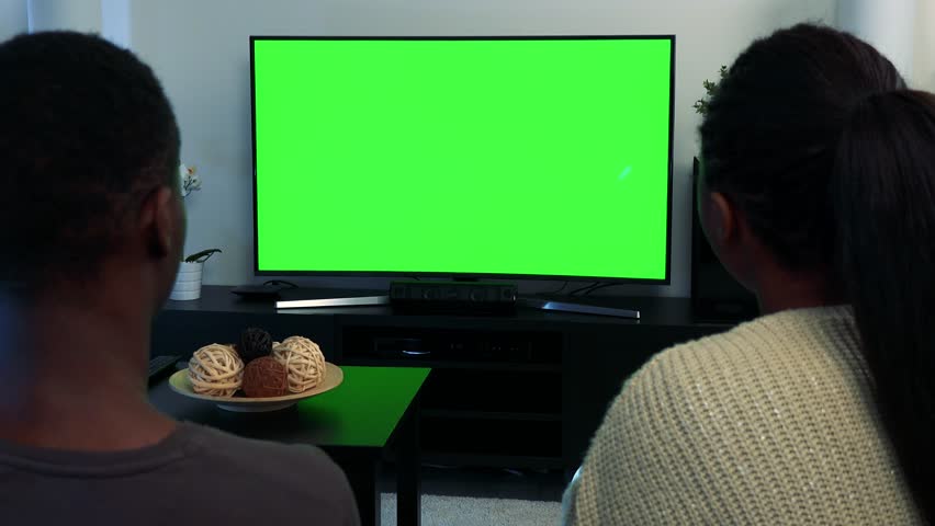 Young Black Couple Watch Television Stock Footage Video (100% Royalty-free) 33521011 | Shutterstock