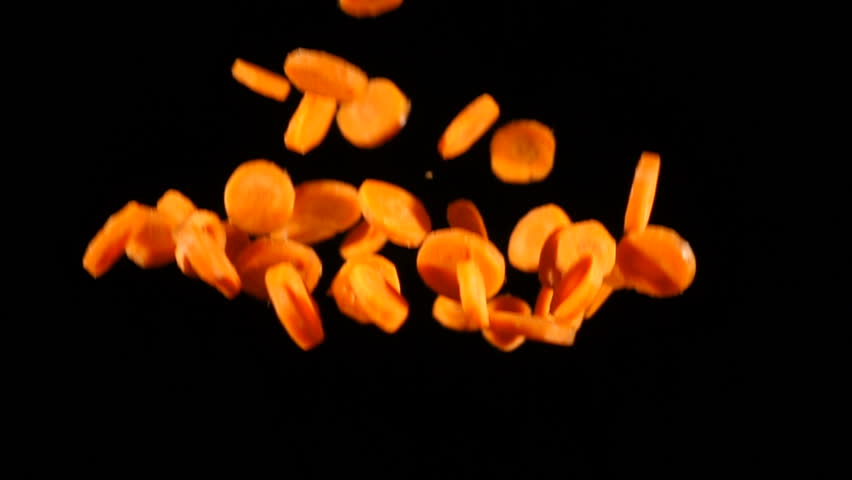 Falling Cutted Carrot Slices Isolated Stock Footage Video (100% Royalty ...