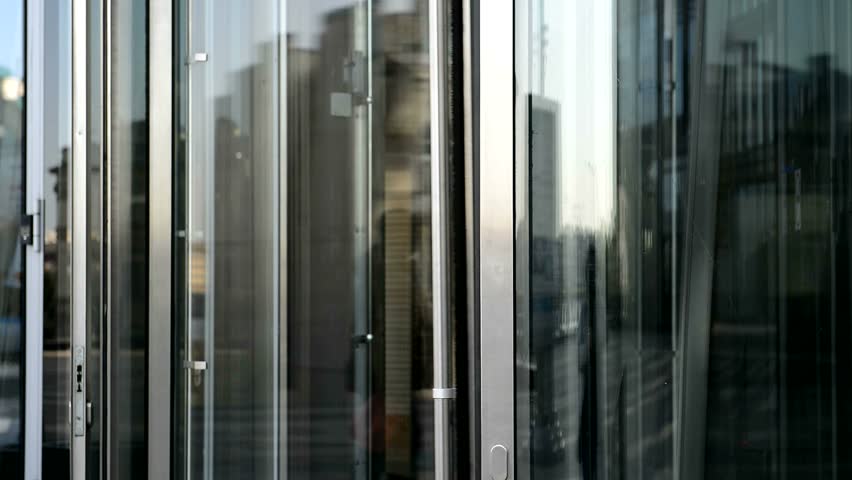 glass rotating door turntable entrance business Stock Footage Video ...