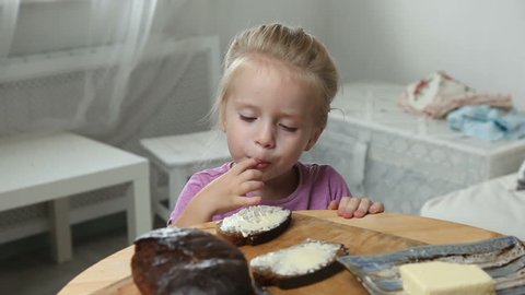 Cute Little Girl Leak Butter Sandwich Stock Footage Video (100% Royalty ...