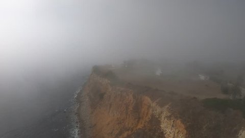 Flying Through Fog Toward Light House Stock-video (100 % royaltyfri ...