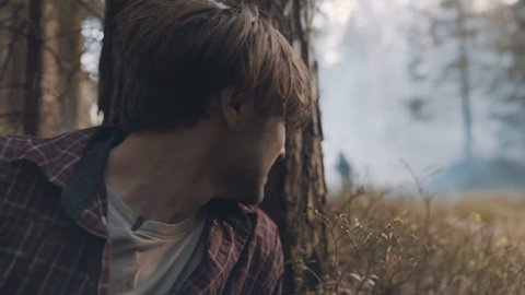 Scared Man Hiding Behind Tree Mysterious Stock Footage Video (100% ...