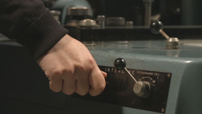 hand using old film editing equipment Stock Footage Video (100% Royalty ...