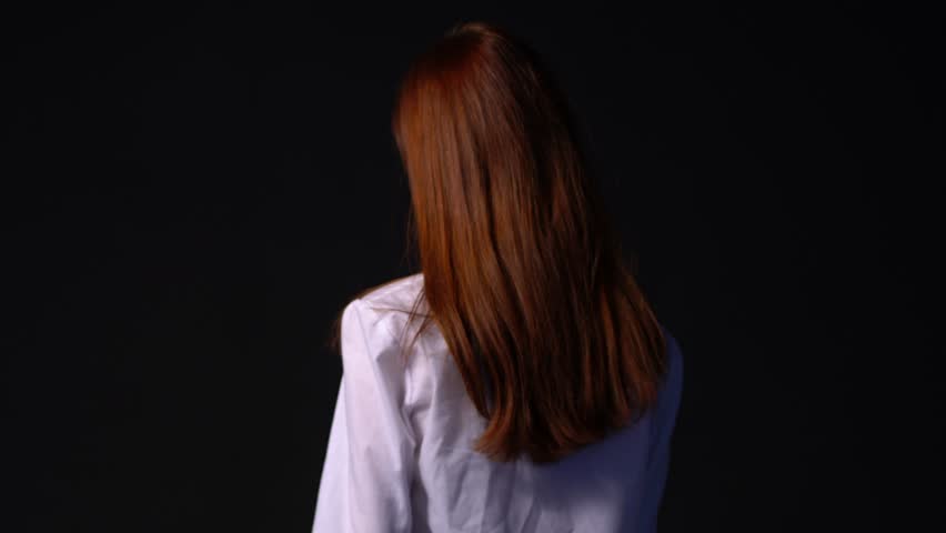 woman turns around looks camera Stock Footage Video (100% Royalty-free ...