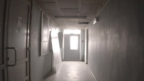 walking light through endless corridor closed Stock Footage Video (100% ...