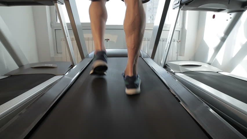athlete's feet on treadmill during sporty Stock Footage Video (100% ...