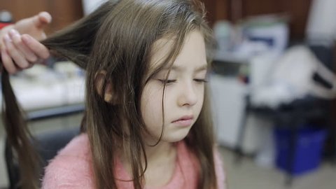 Little Girl Crying Until Hairdresser Combs Stock Footage Video (100% ...