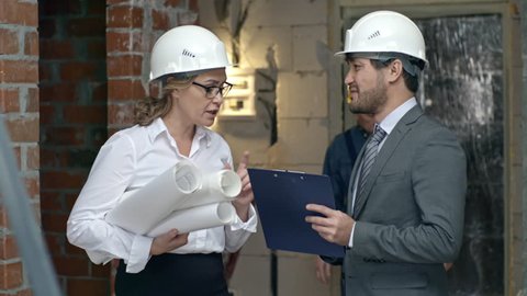 Tilt Female Construction Project Manager Blueprints Stock Footage Video ...