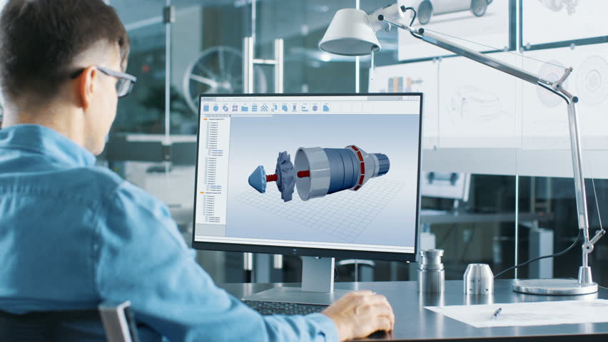 Engineer Working On A Personal Computer He S Designing New Efficient ...