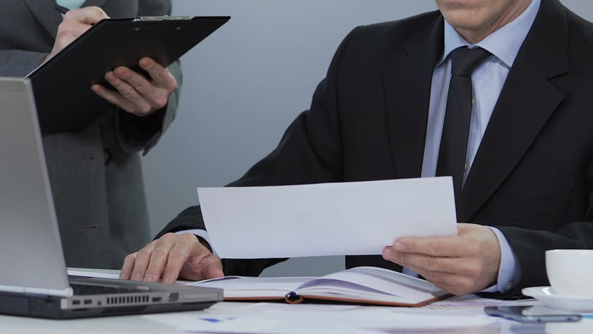 boss giving instructions secretary writing list Stock Footage Video ...