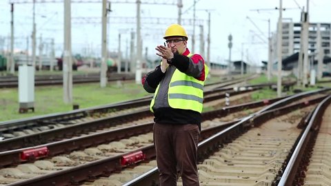 Angry Railway Worker Talks On Cell Stock Footage Video (100% Royalty ...