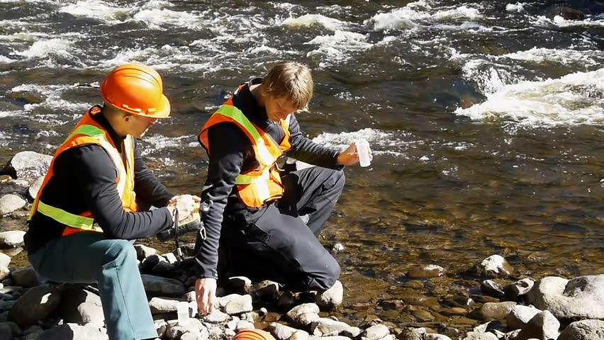 conservation workers taking water samples Stock Footage Video (100% ...