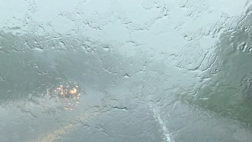 heavy rain on windshield while driving Stock Footage Video (100% ...