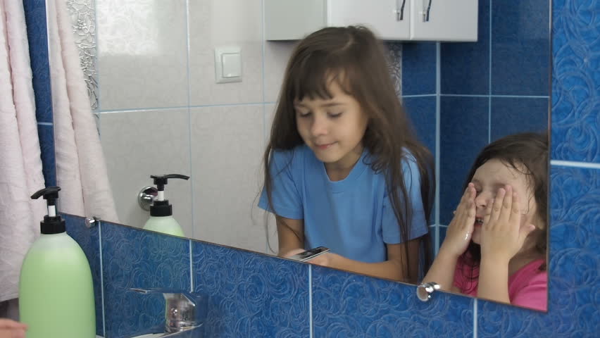children washes sisters wash their faces Stock Footage Video (100% ...