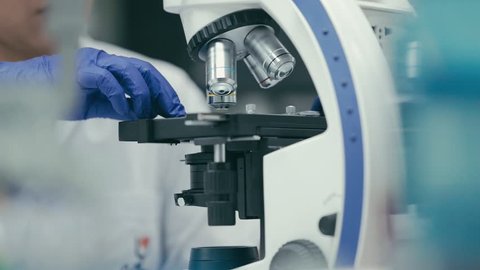 Scientists Using Microscope Bio Lab Experiment Stock Footage Video (100 ...