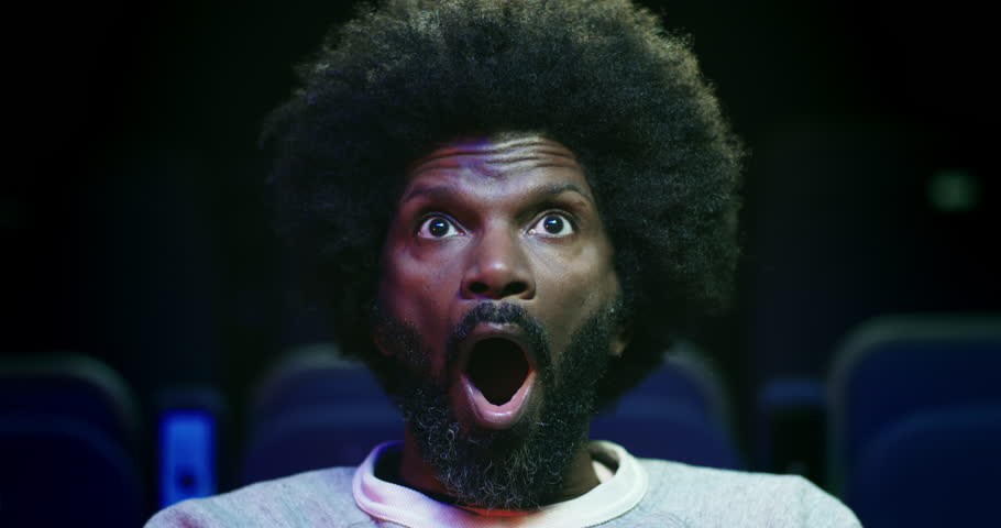 shocked gasp reaction man movie theatre Stock Footage Video (100% ...