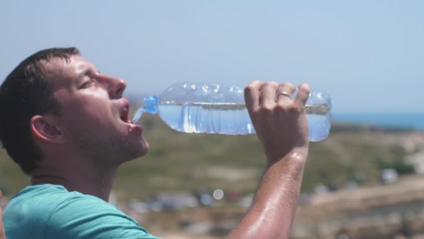 Handsome Man Drinking Water During Stock Footage Video (100% Royalty ...