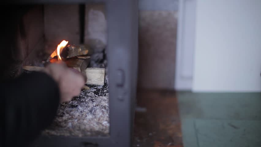 Stoking the Fire Stock Footage Video (100% Royalty-free) 3540032 ...