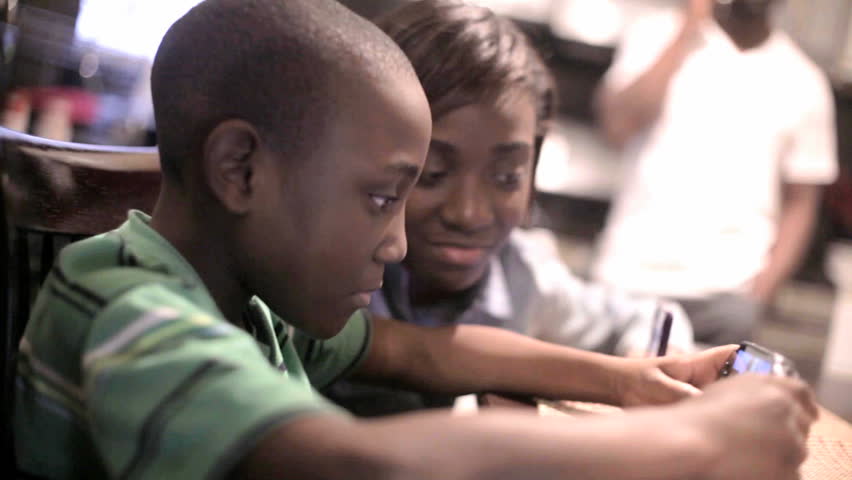 african american black kid playing video Stock Footage Video (100% ...