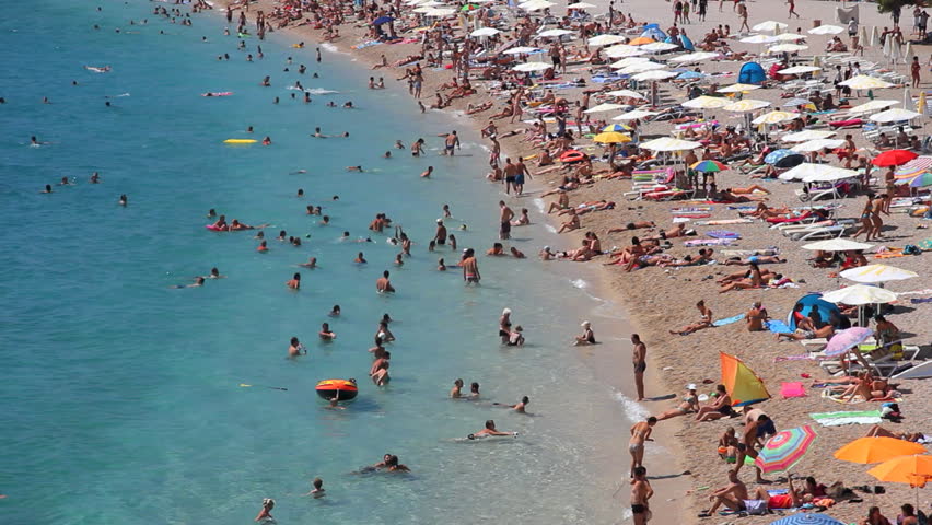 People On the Beach, Sunbathing Stock Footage Video (100% Royalty-free ...