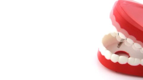 Chattering Teeth Walking Across White Background Stock Footage Video ...