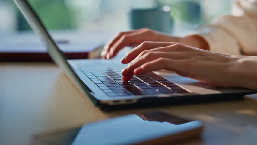 Lady fingers typing laptop in office environment closeup. Smiling woman ...