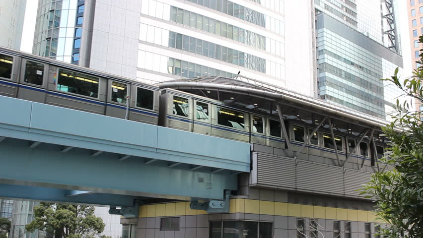 Commuter Train Leaves Shiodome Station Stock Footage Video (100% ...