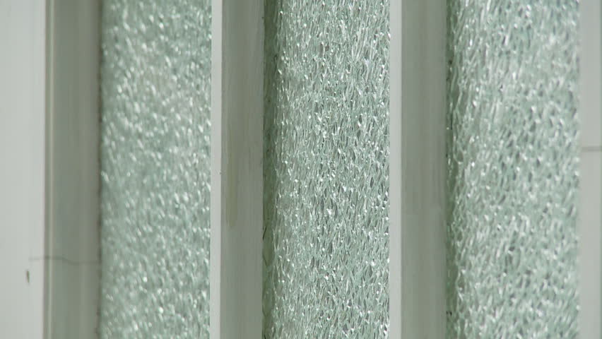 fist smashing through glass panel Stock Footage Video (100% Royalty ...