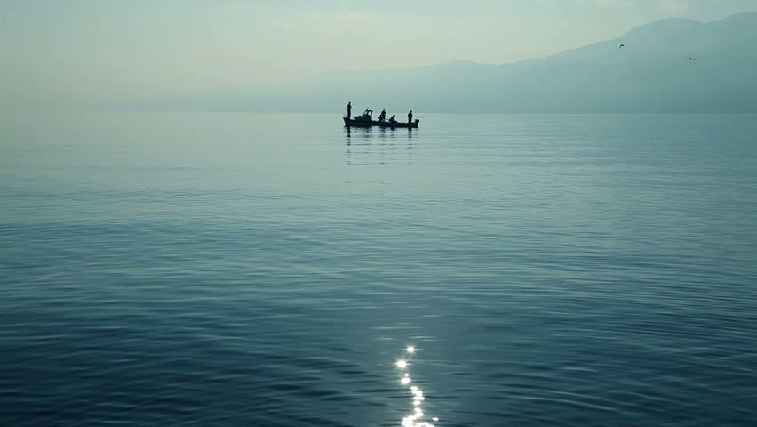 fishermen fishing on boats far away Stock Footage Video (100% Royalty ...