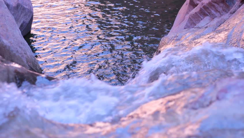 water traversing down red rocks falling Stock Footage Video (100% ...