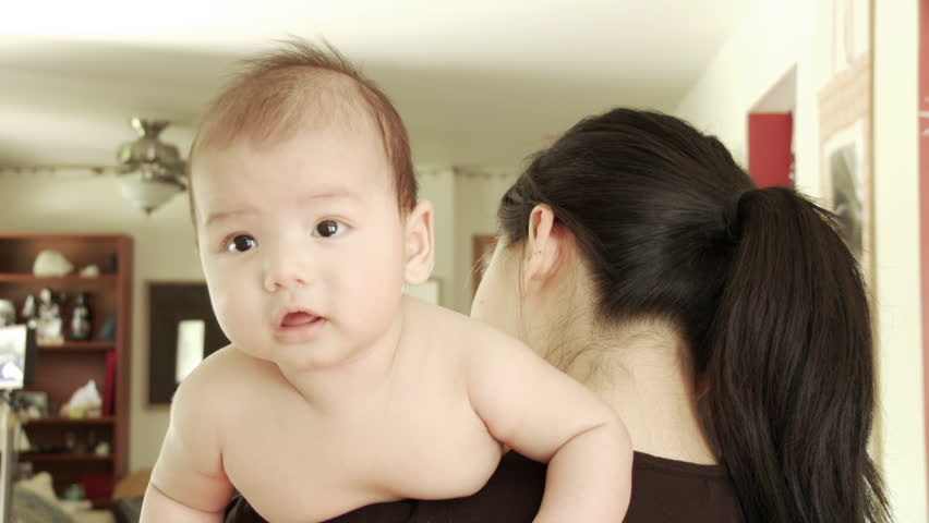 Baby Looking Over Moms Shoulder Stock Footage Video (100% Royalty-free ...