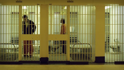 inmate standing bars his prison cell Stock Footage Video (100% Royalty ...