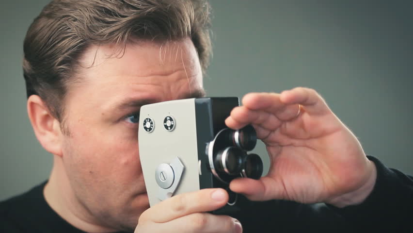 cameraman shoots small film movie camera Stock Footage Video (100% ...
